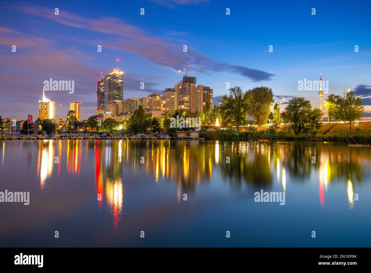 City Skyline at dusk, River Danube, Alte Donau, Vienna, Austria, Europe ...