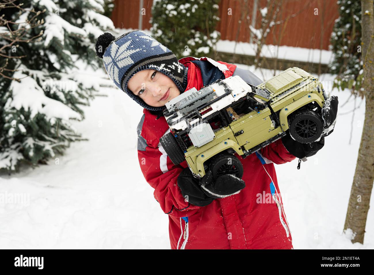 Ternopil, Ukraine- February 06, 2023: Kid boy play with Lego Technic ...