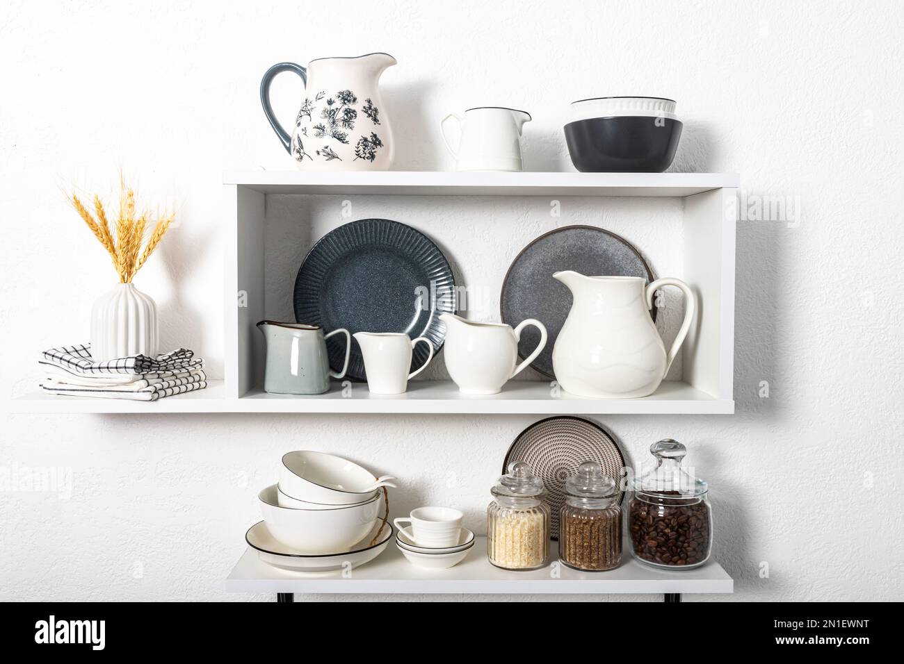 Front view of the kitchen beautiful ceramic and porcelain dishes on ...