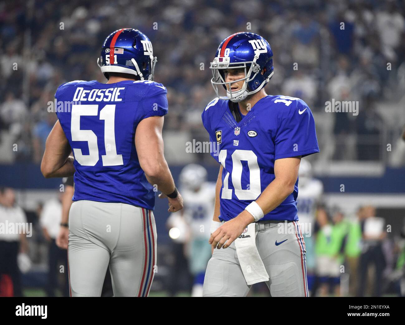 New York Giants long snapper Zak DeOssie (51) and quarterback Eli ...