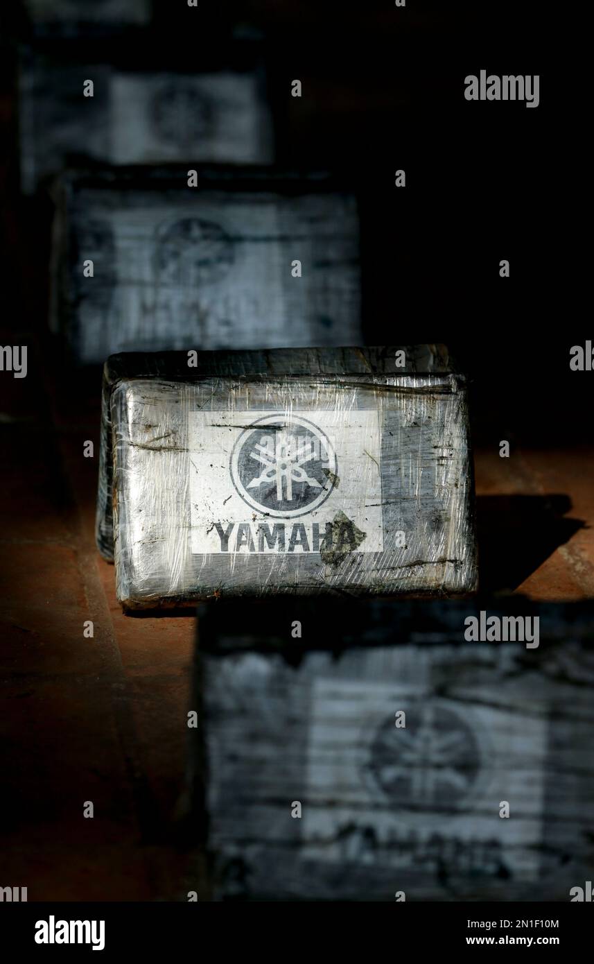 Seized packages containing cocaine are displayed during a press ...