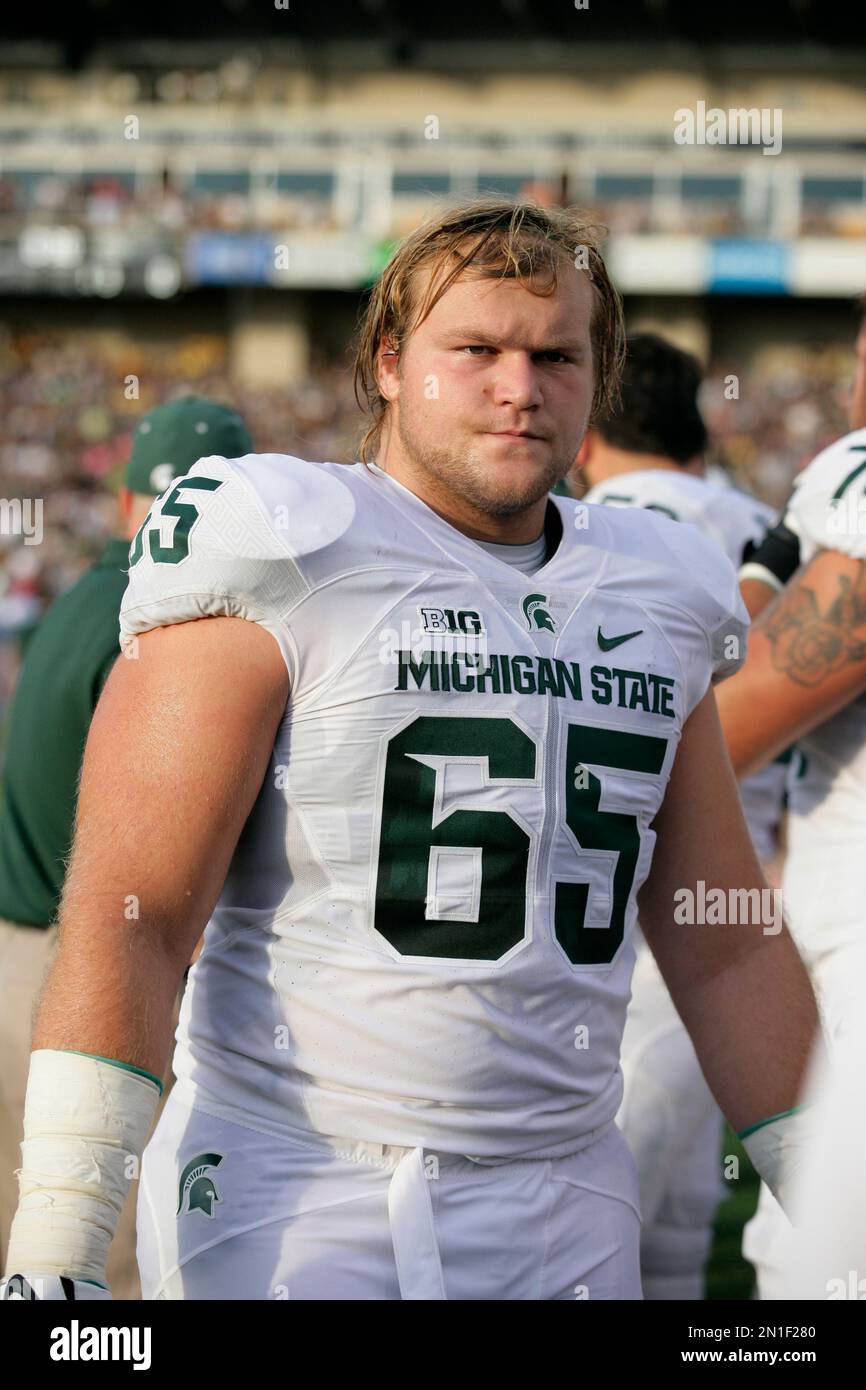 Michigan State offensive lineman Brian Allen is seen before an NCAA ...