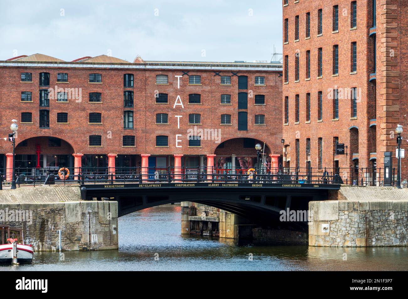Road bridge and Tate building at the Albert Dock, Liverpool, Merseyside ...
