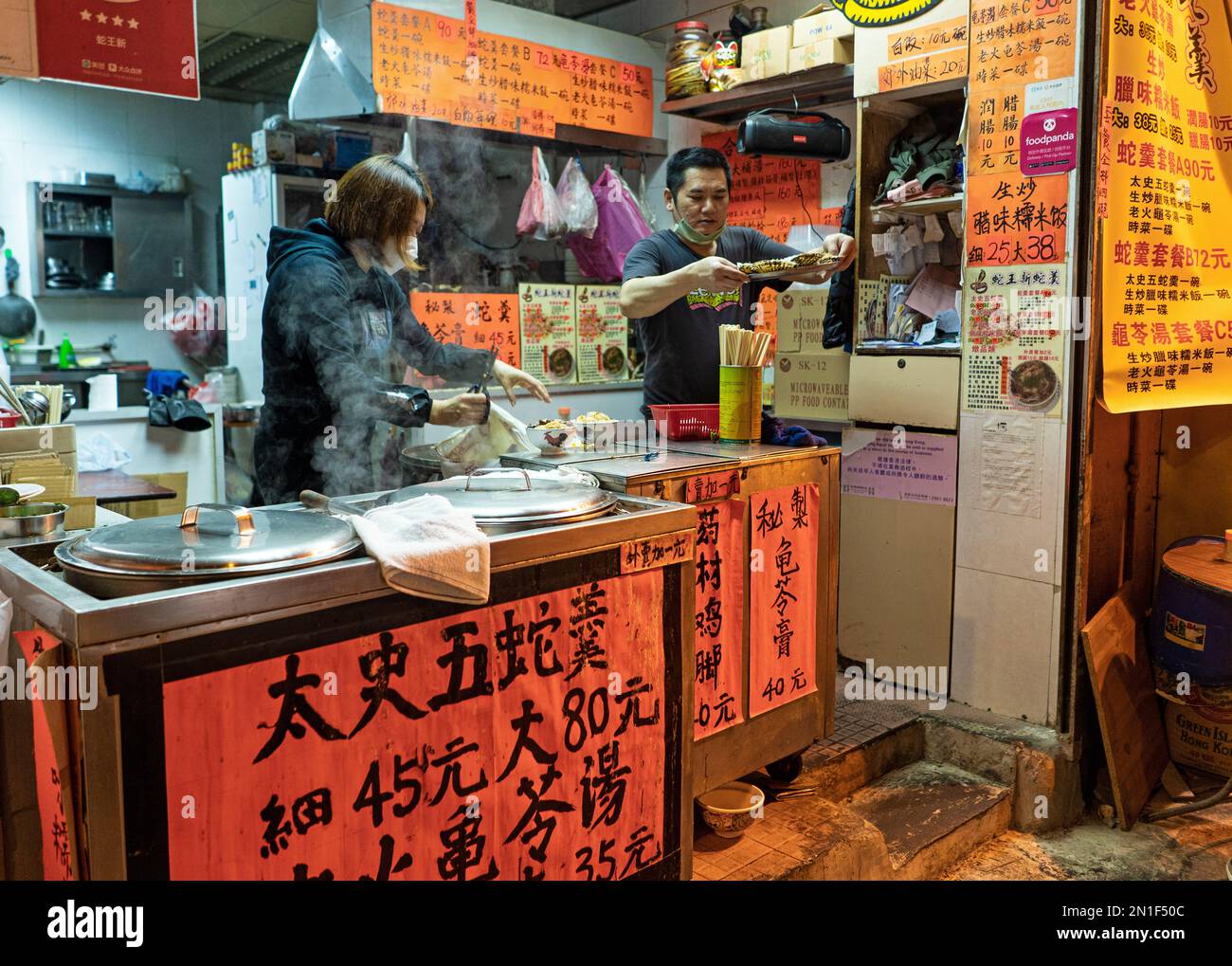 Hong Kong - Open air restaurant stall selling food in Yau Ma Tei ...
