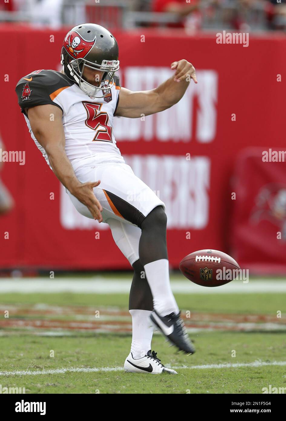 Tampa Bay Buccaneers punter Jacob Schum (5) kicks the ball during the ...