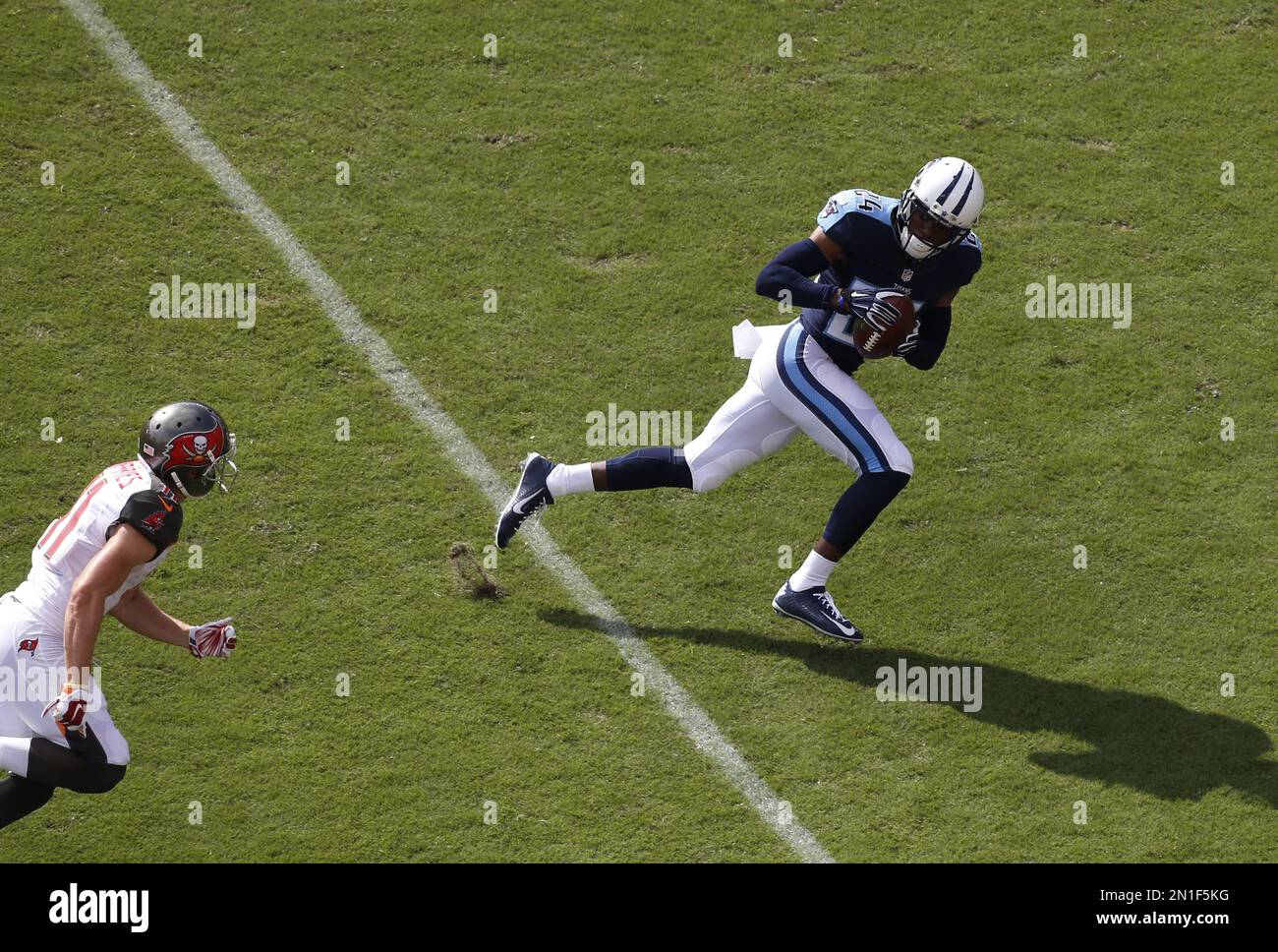 Tennessee Titans cornerback Coty Sensabaugh (24) intercepts a pass as ...