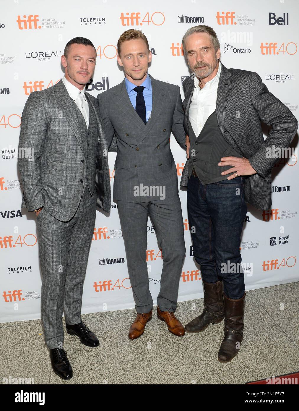 Actors Luke Evans, from left, Tom Hiddleston and Jeremy Irons attend ...