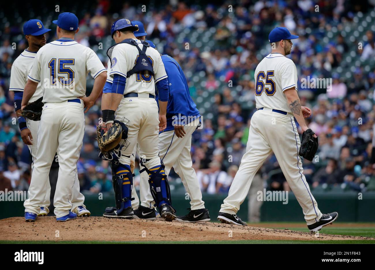 Seattle Mariners starting pitcher James Paxton (65) walks off the mound ...