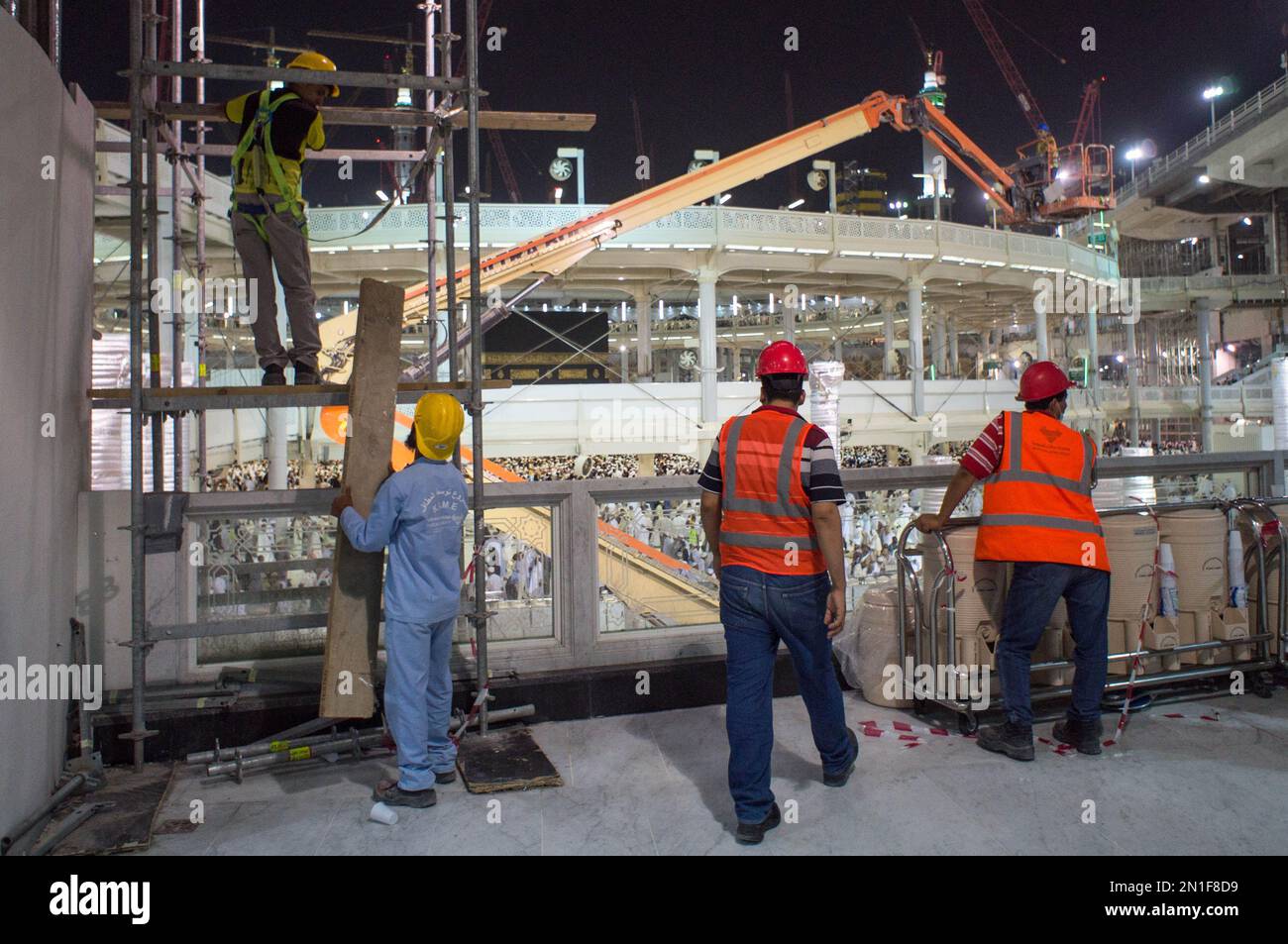 Construction workers work at the Grand Mosque in the Muslim holy city ...