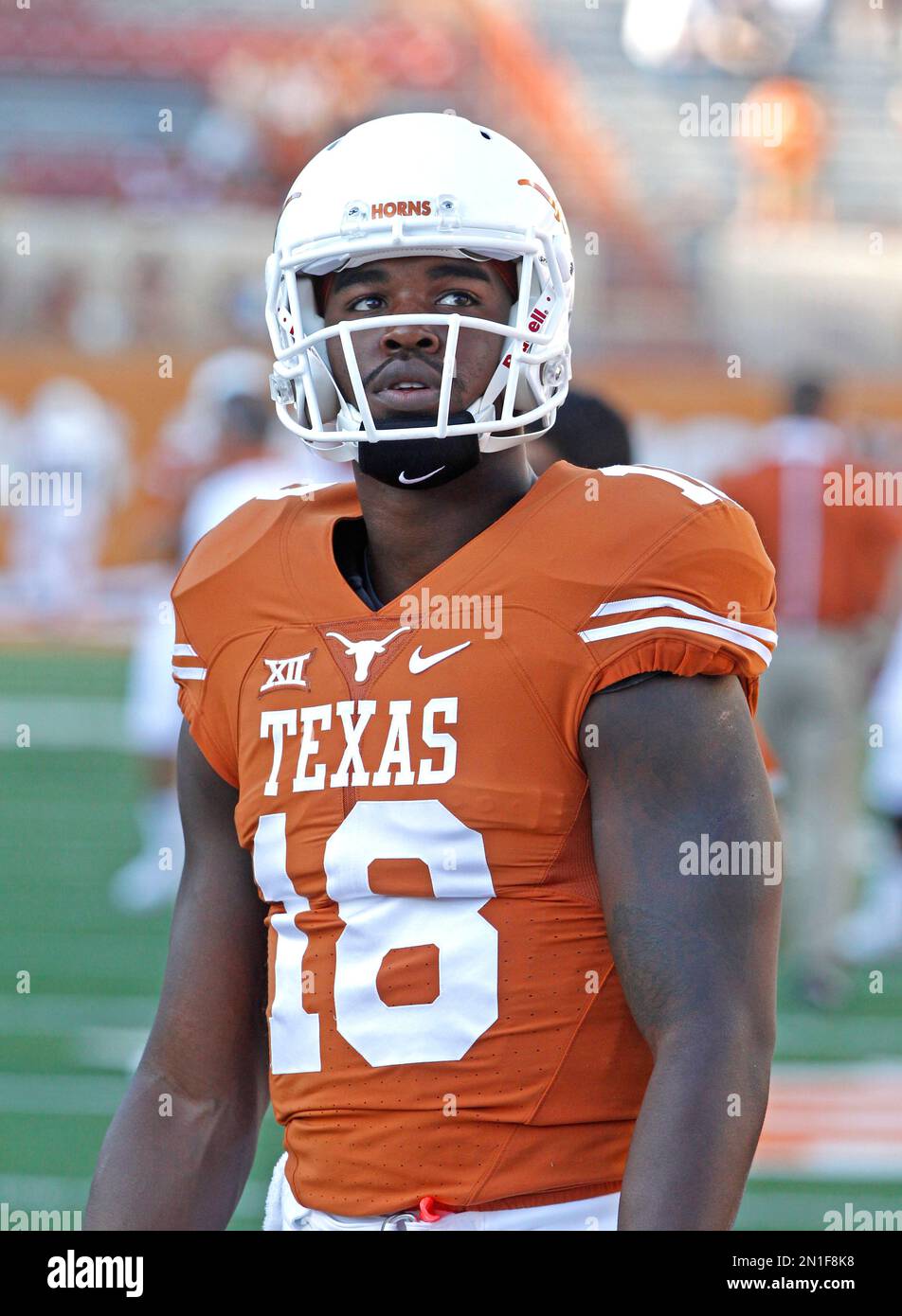 Texas quarterback Tyrone Swoopes looks on before the start of an NCAA ...