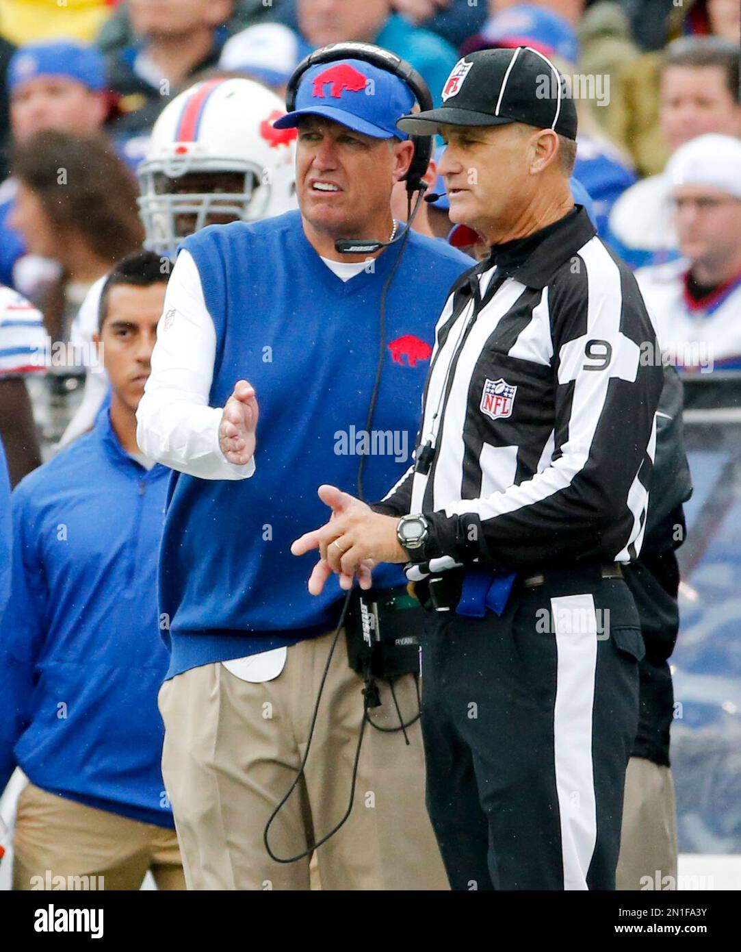 Buffalo Bills head coach Rex Ryan, left, talks with line judge Mark ...