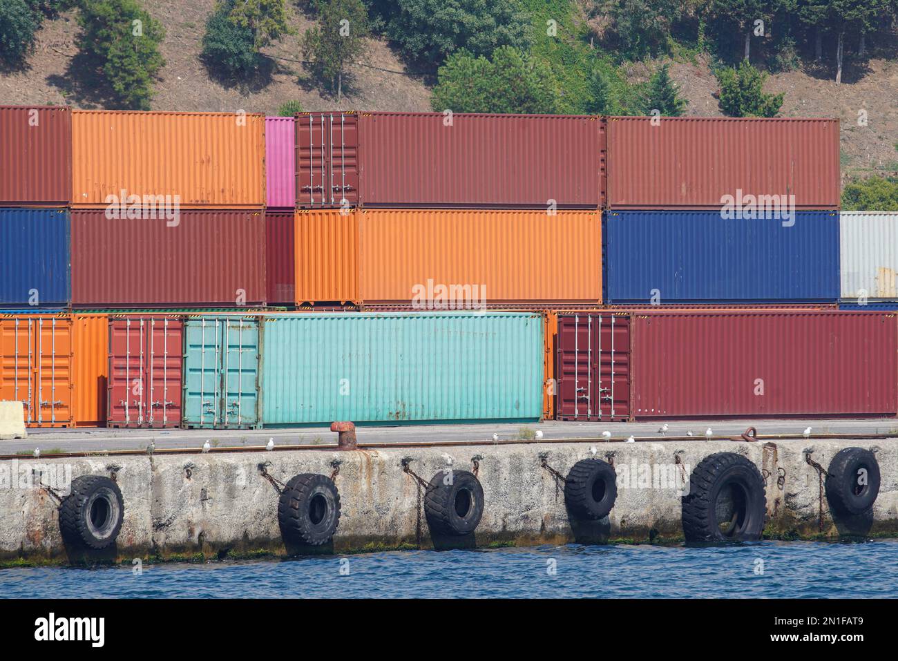 Containers waiting to transfer in a port Stock Photo - Alamy