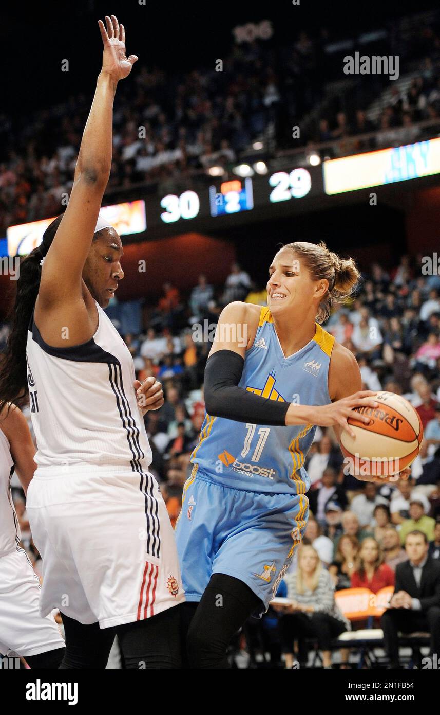 Connecticut Sun’s Kelsey Bone, left, guards Chicago Sky’s Elena Delle ...