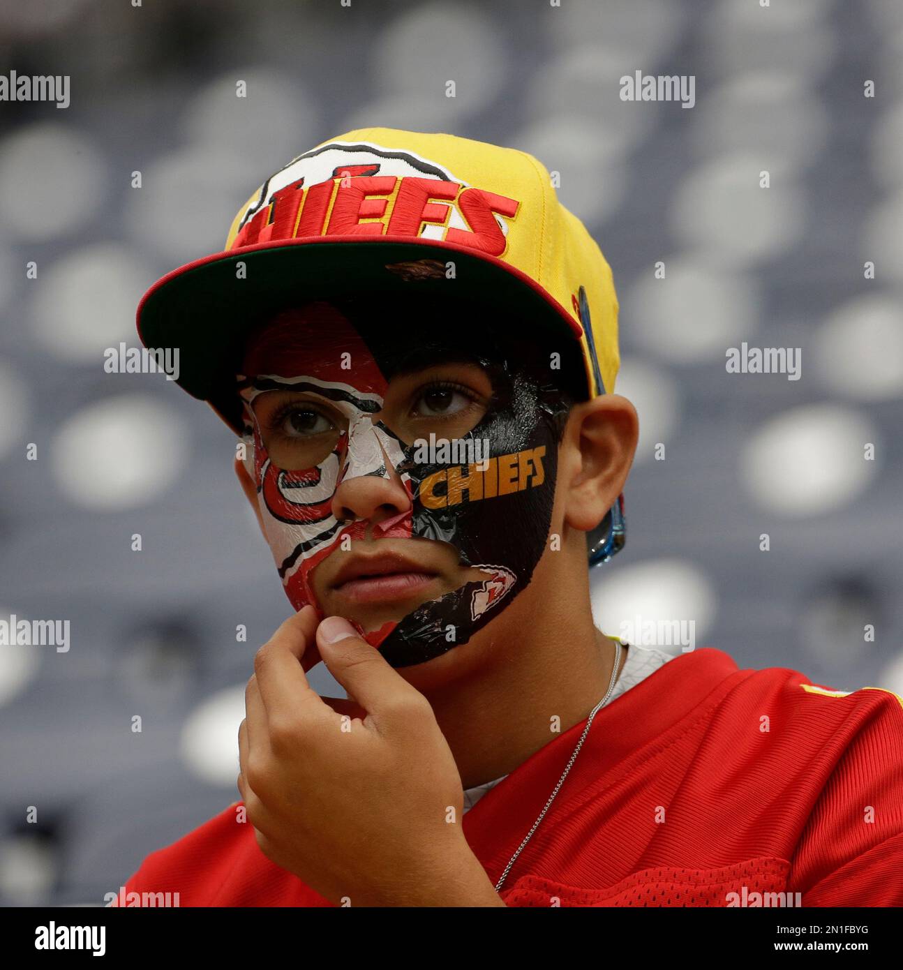 A Kansas City Chiefs fan is shown before an NFL football game Sunday ...