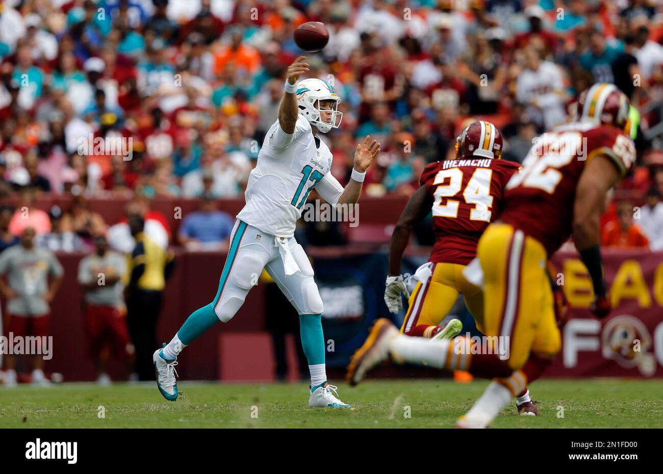 Miami Dolphins quarterback Ryan Tannehill (17) throws in front of ...