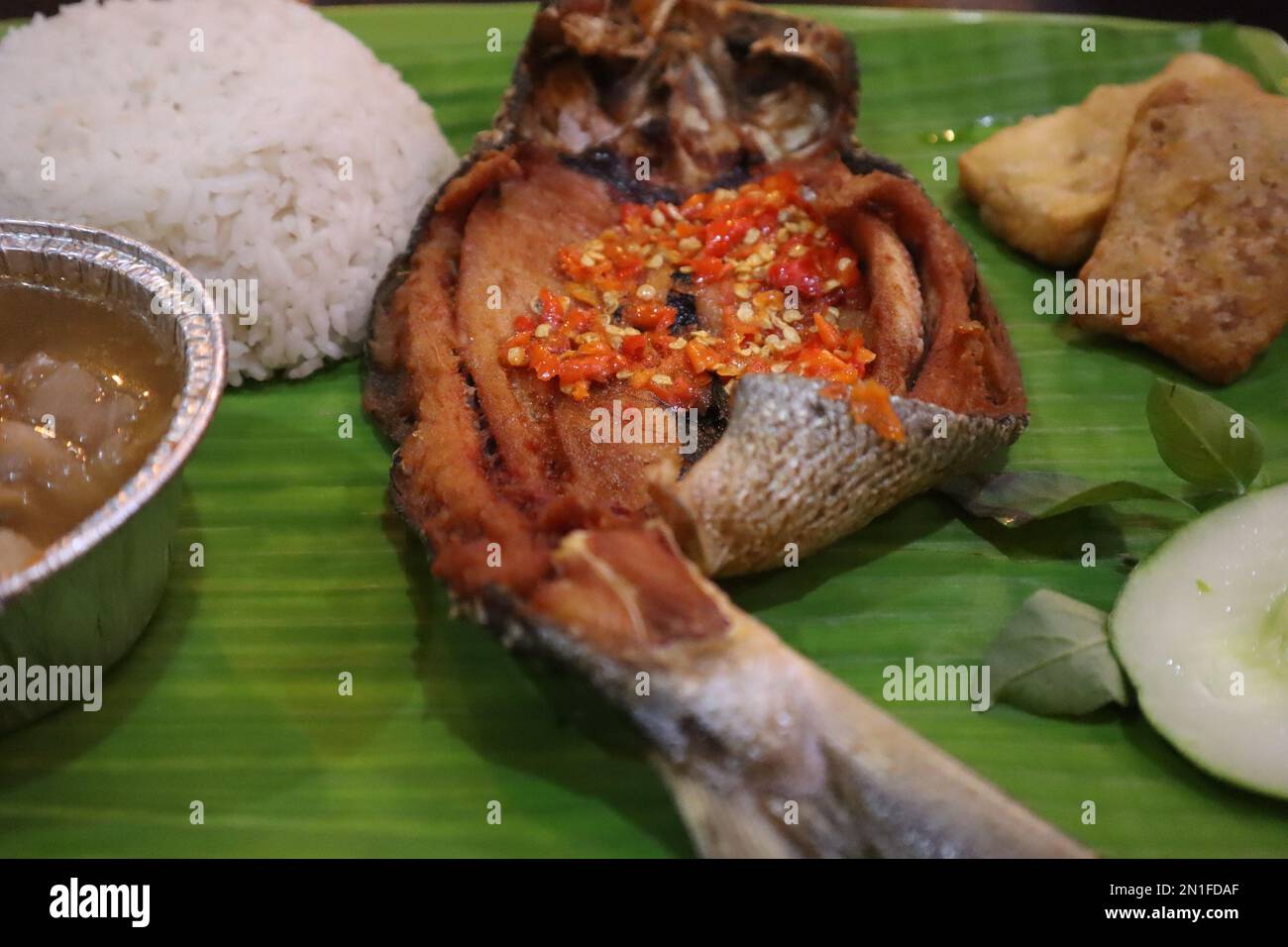 Fried fish with sambal, vegetables from Indonesia with white rice ...