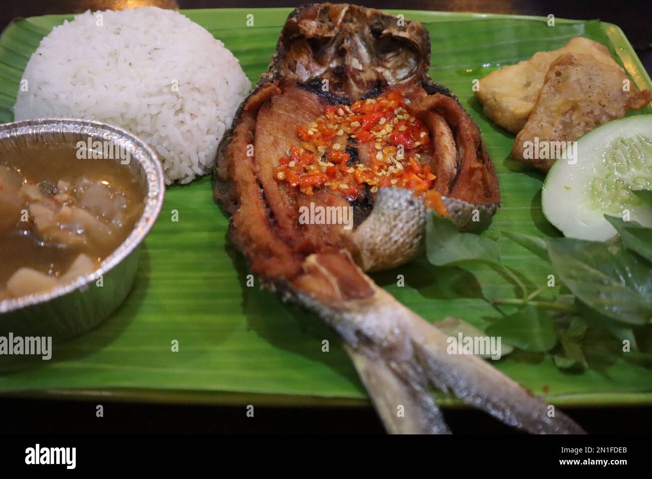 Fried fish with sambal, vegetables from Indonesia with white rice ...