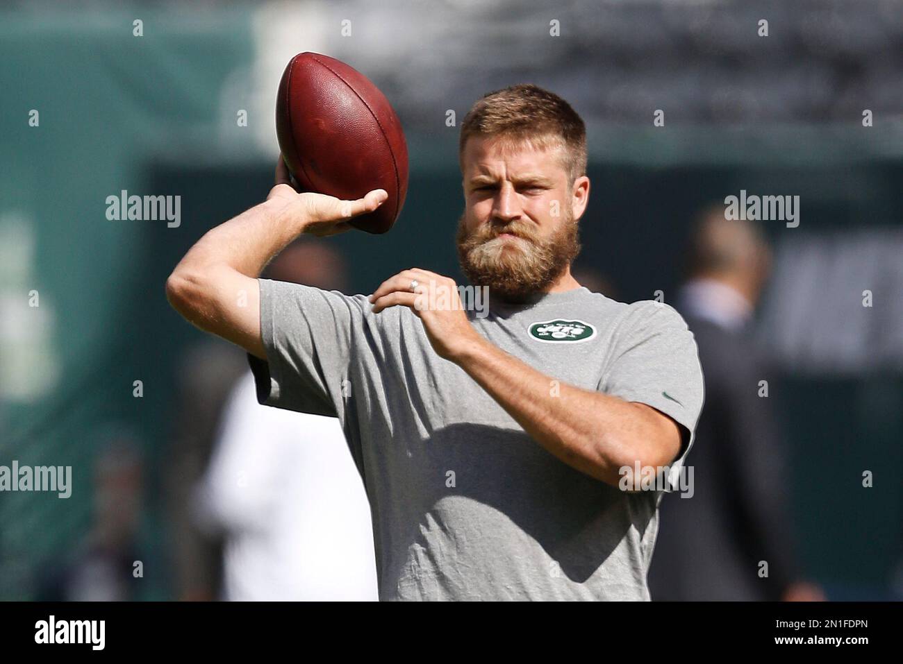 New York Jets quarterback Ryan Fitzpatrick throws a pass before an NFL ...