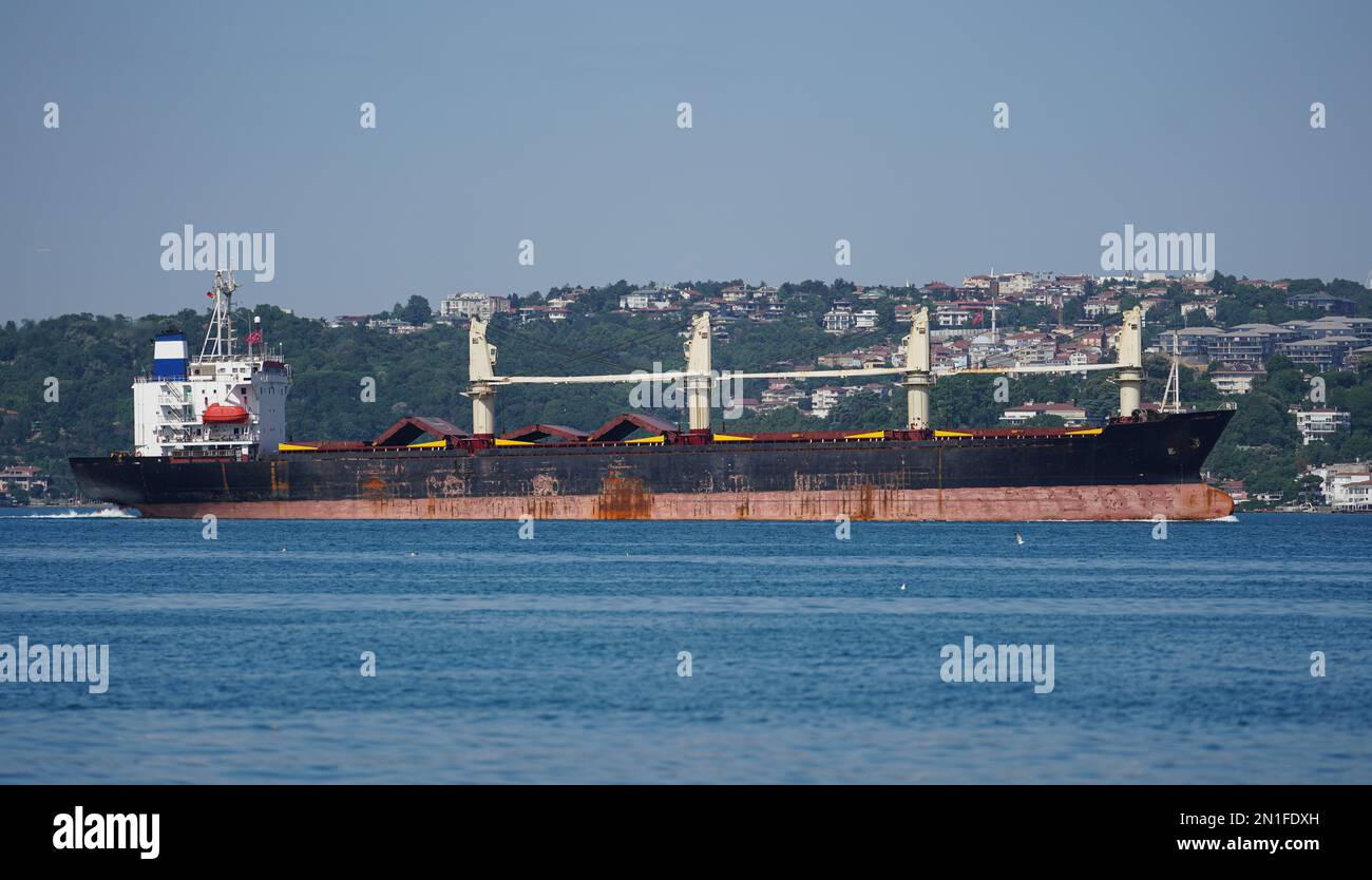 A cargo ship carrying goods between ports Stock Photo - Alamy