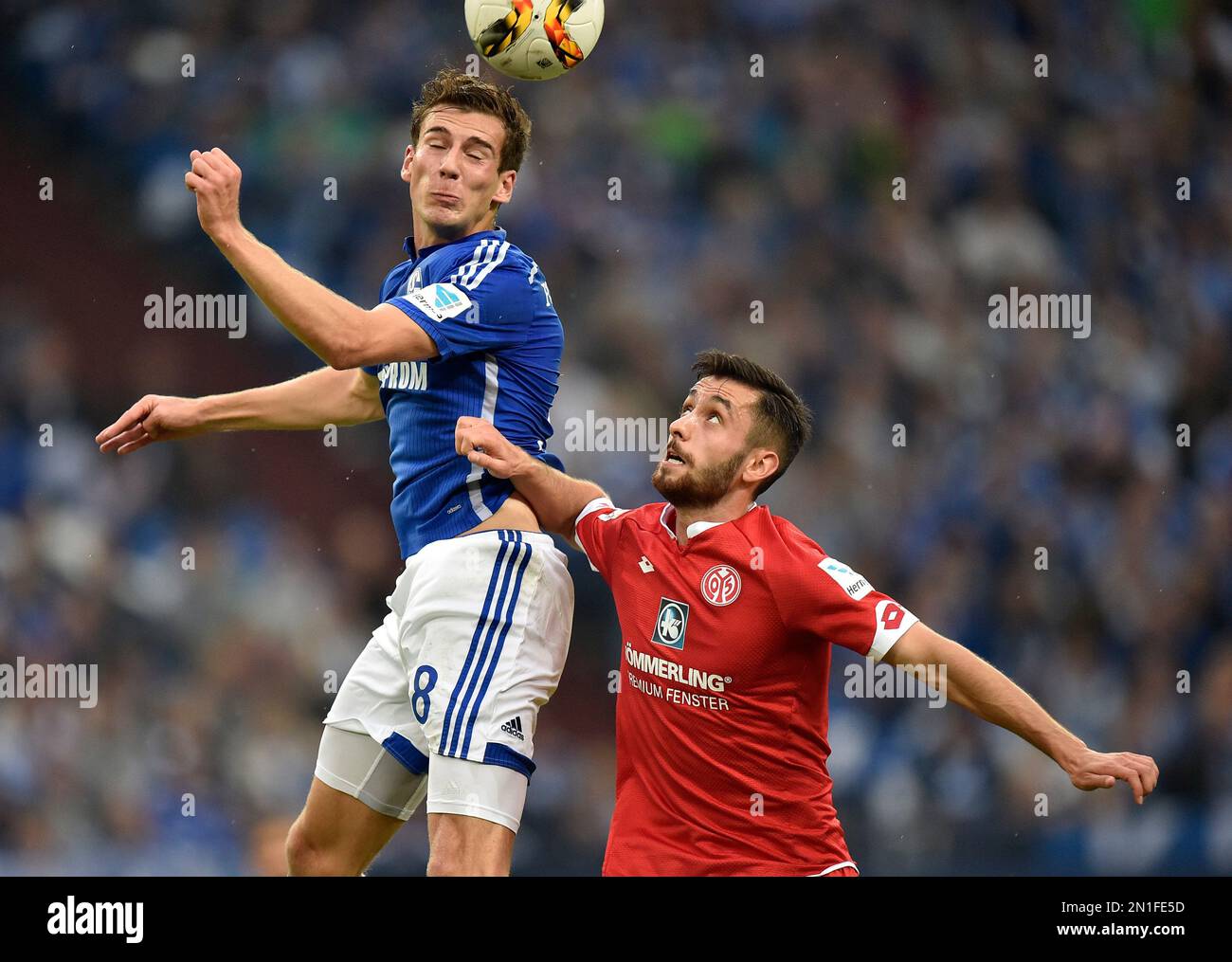 Mainz's Yunus Malli, right, and Schalke's Leon Goretzka challenge for ...