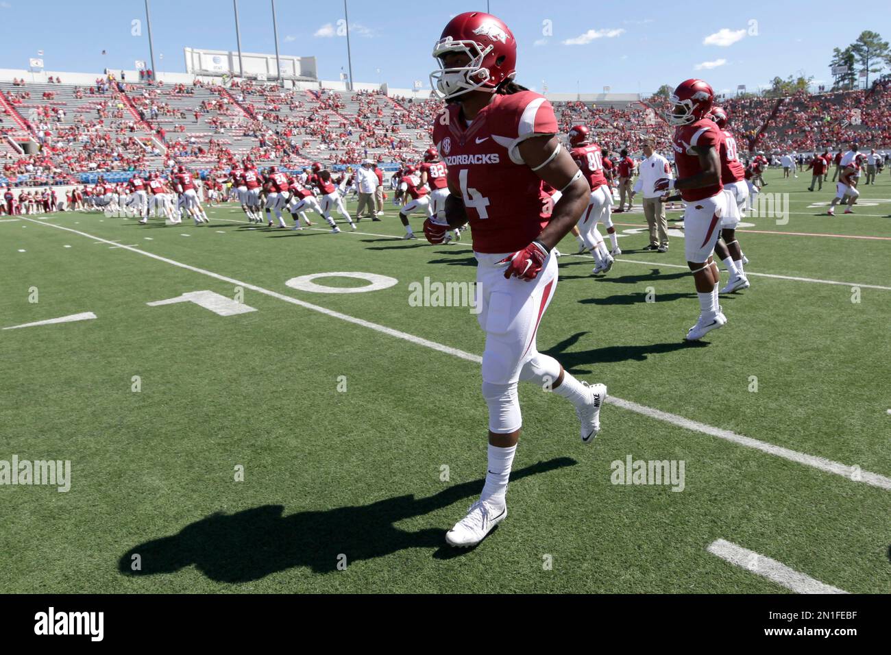 Arkansas wide receiver Keon Hatcher (4) warms up before an NCAA college ...