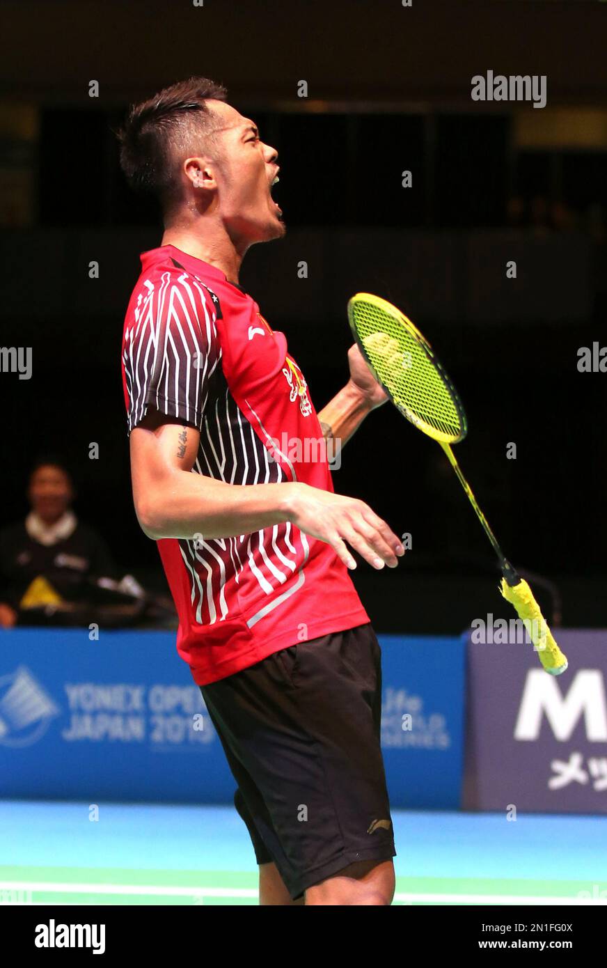 China's Lin Dan celebrates after defeating Denmark's Viktor Axelsen ...