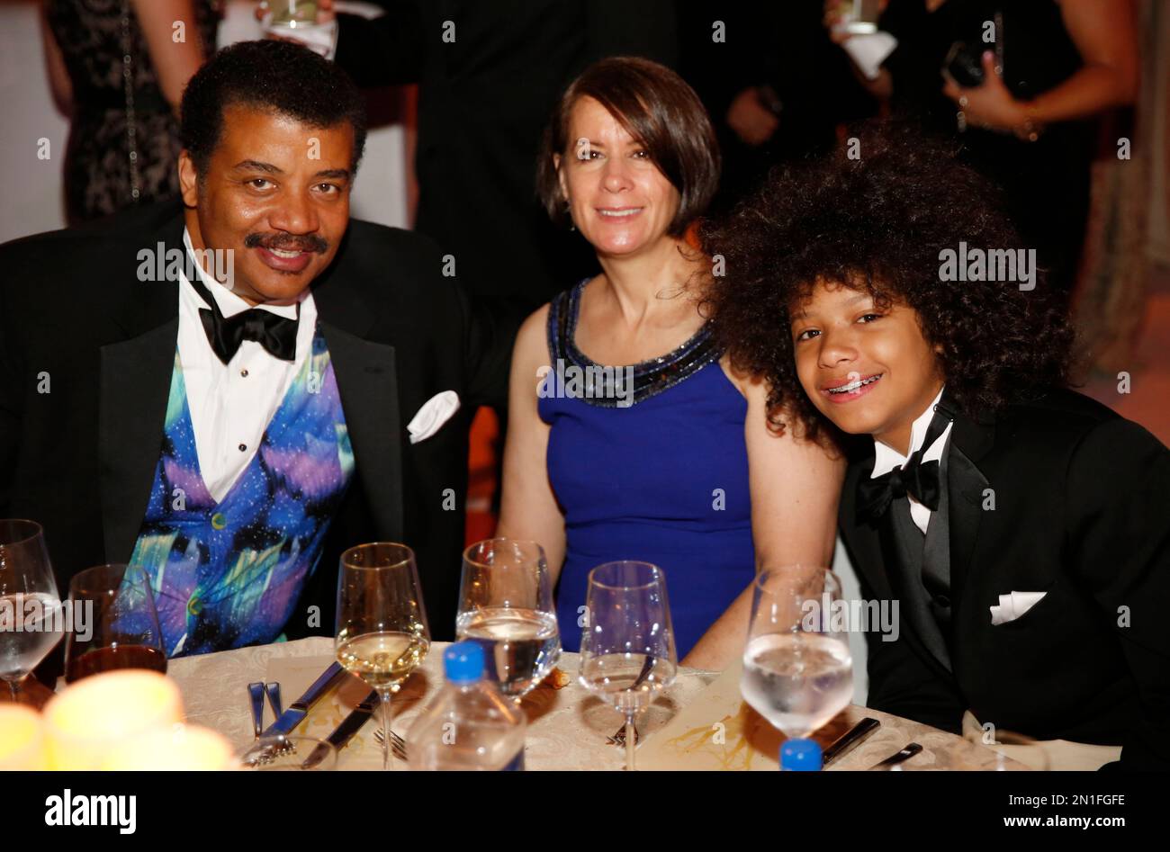 Neil deGrasse Tyson, wife, Alice Young, and son Travis Tyson attend the ...