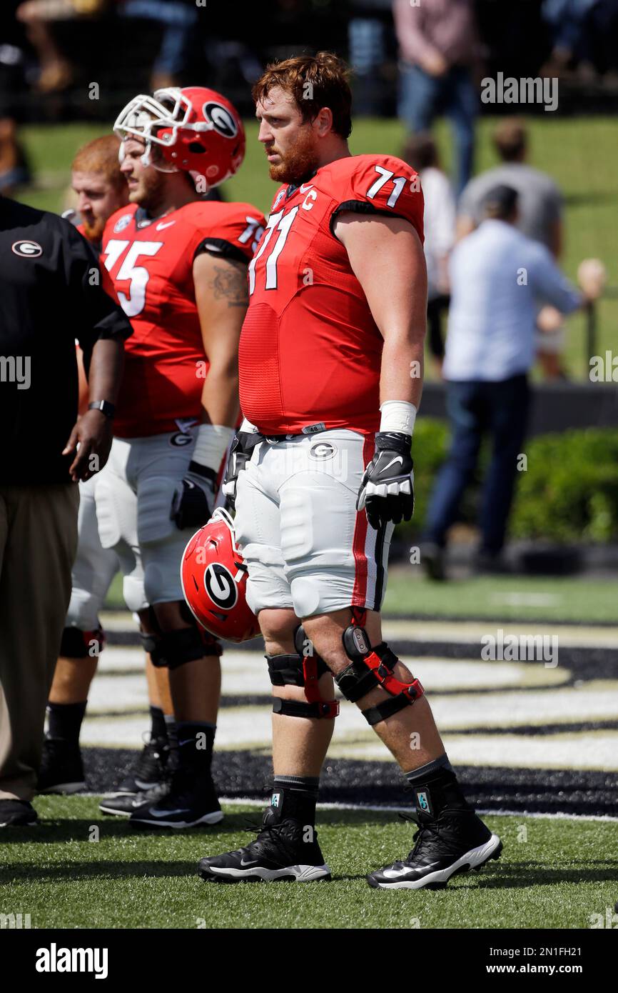 Georgia offensive tackle John Theus (71) warms up before the start of ...