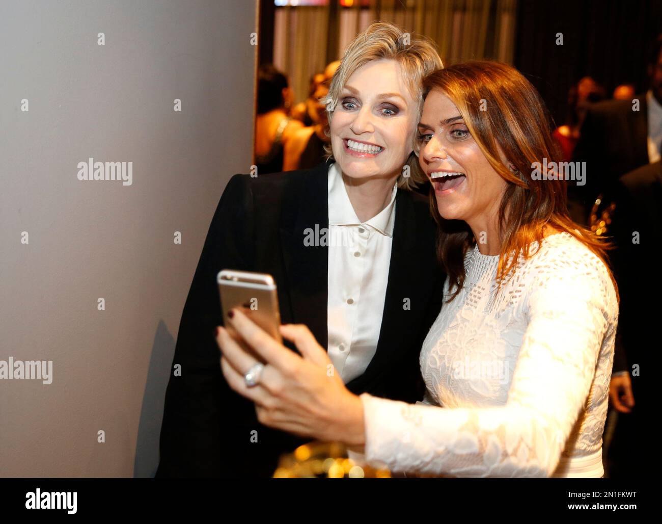 EXCLUSIVE - Jane Lynch, left, and Amy Landecker pose backstage at the ...