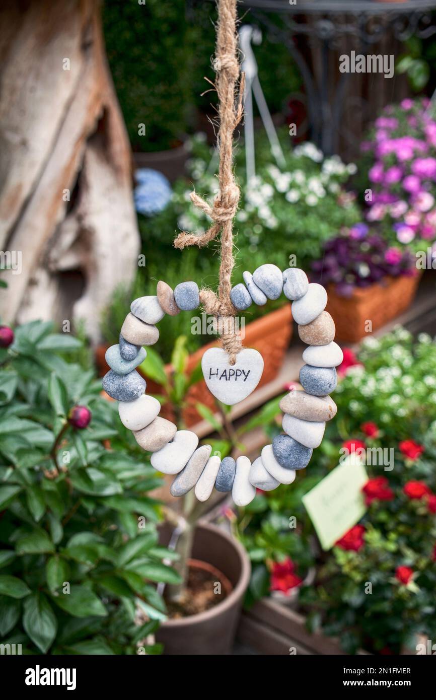 Happy greeting sign with flower Stock Photo - Alamy