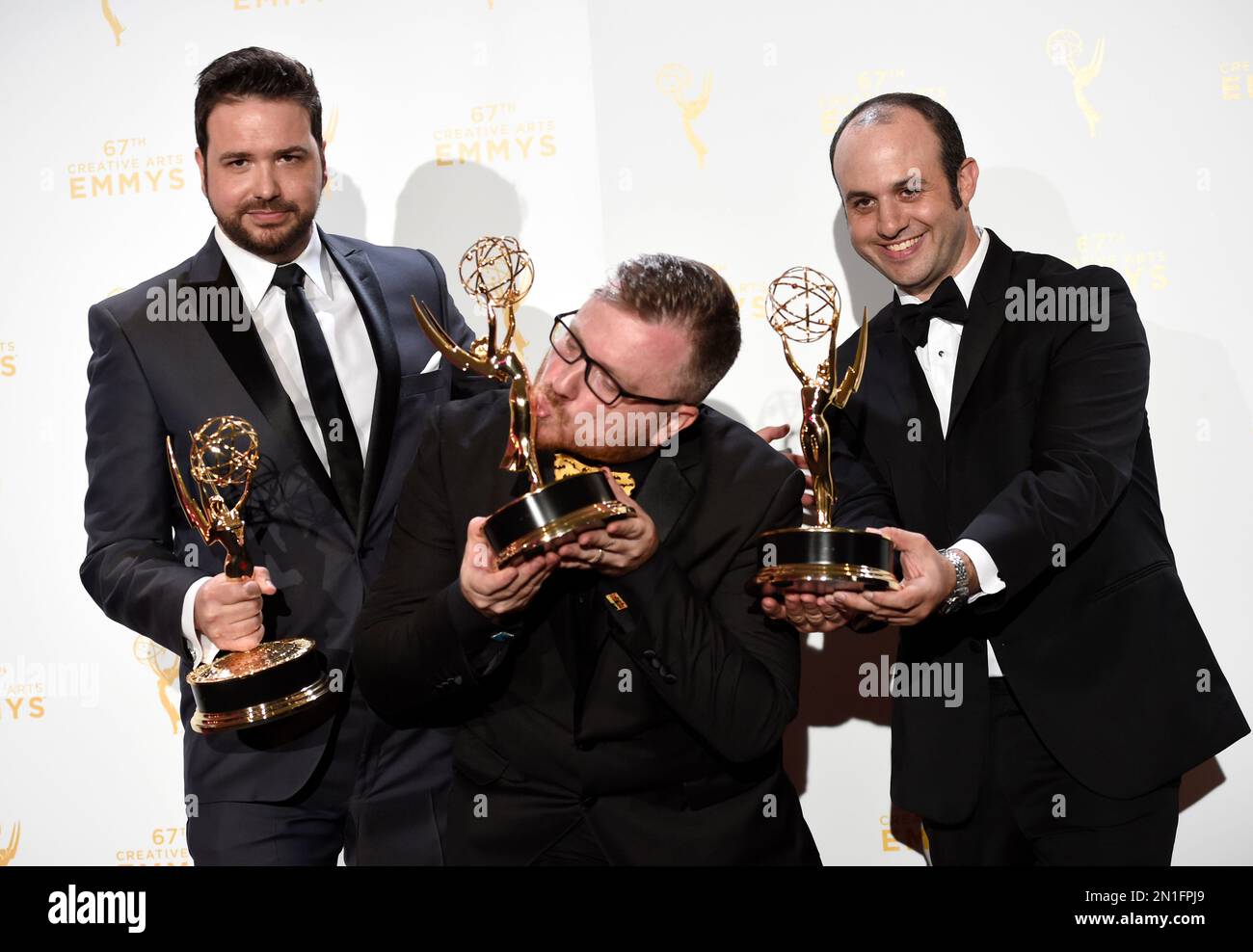 Josh Earl, from left, Alexander Rubinow and Alex Durham, winners of the ...