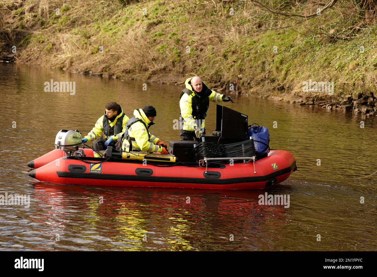 Peter Faulding (right) CEO and workers from private underwater search ...