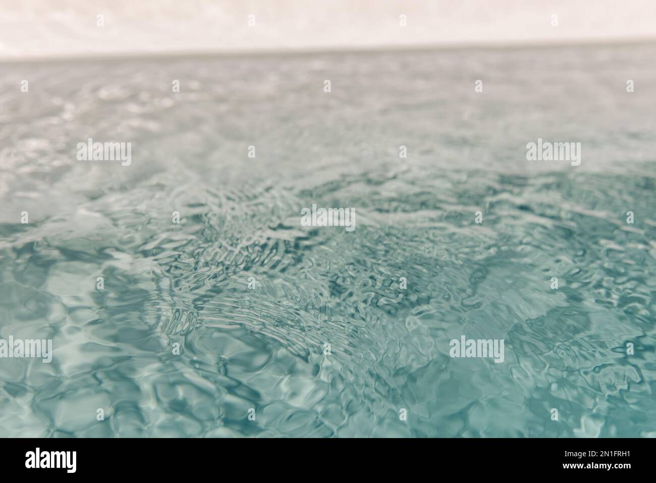 Water texture in blue swimming pool reflecting the sun rippled Stock ...