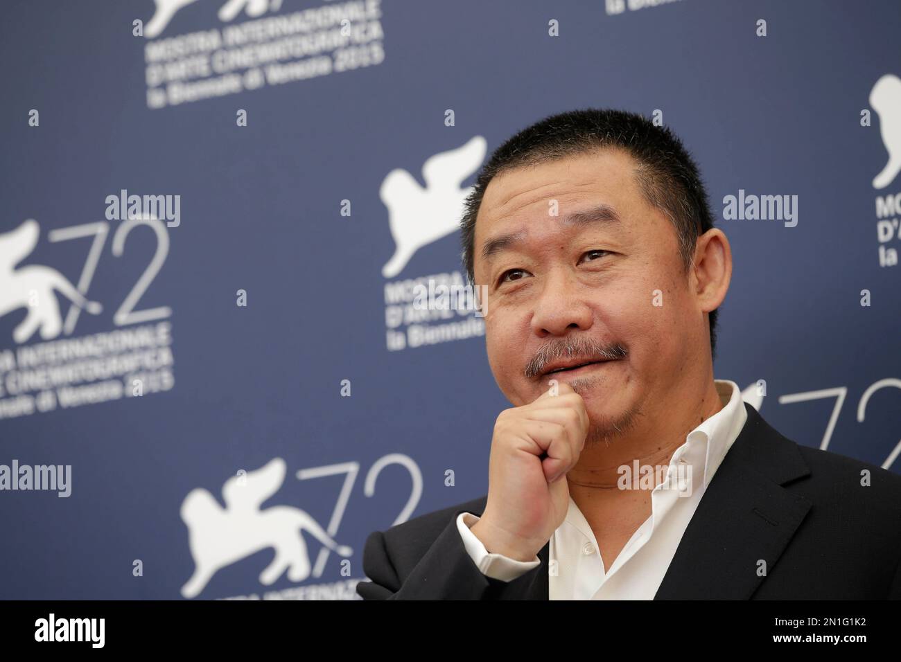 Actor Liu Hua poses during the photo call for the movie Lao Pao Er (Mr ...