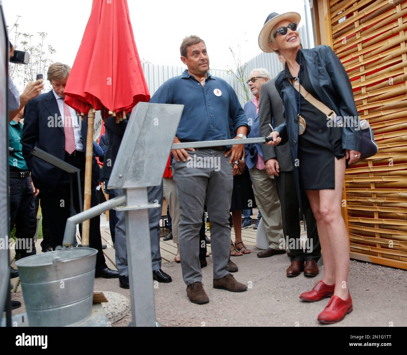Actress Sharon Stone powers a water pump at the Save the Children ...