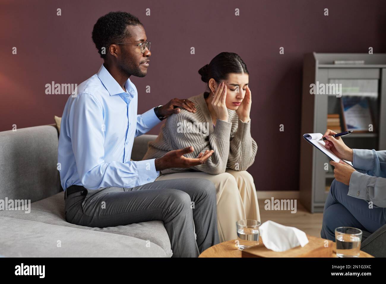 Doctor family ethnic worried hi-res stock photography and images - Alamy
