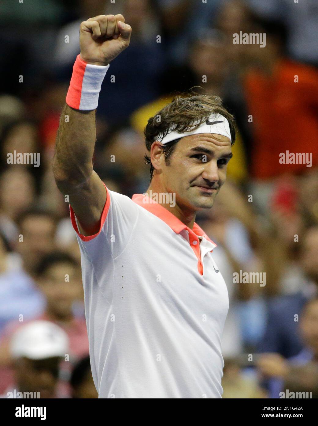 Roger Federer, of Switzerland, waves to the crowd after defeating Stan ...