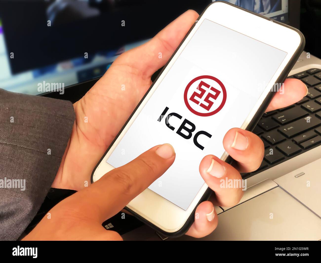 Modern banking icbc mobile application editorial background. Man using ...