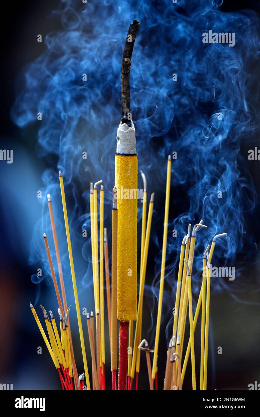 Smoking incense sticks, Ba Thien Hau Chinese Temple, Ho Chi Minh City ...
