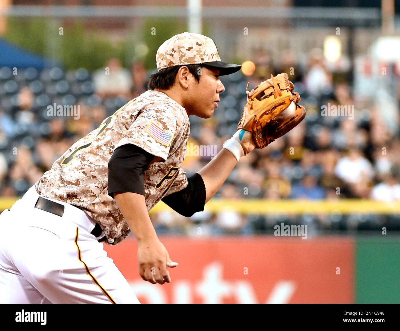 Pittsburgh Pirates' Jung Ho Kang fields a ball off the bat of Milwaukee ...