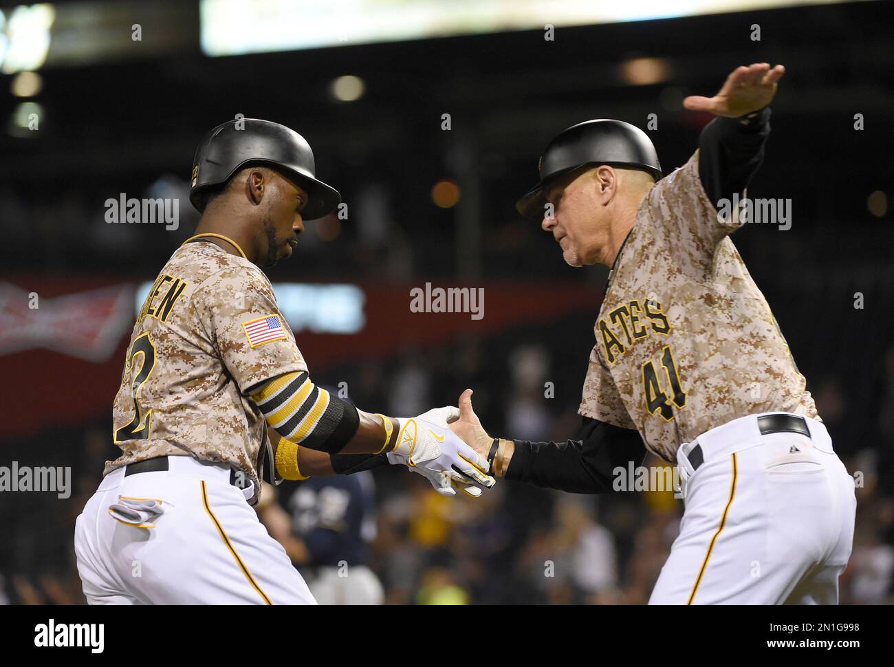Pittsburgh Pirates' Andrew McCutchen, left, is congratulated by third ...