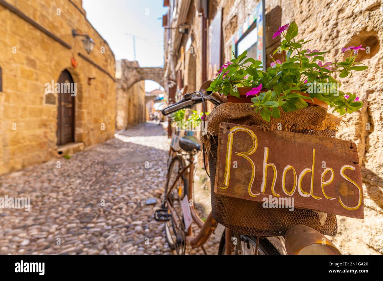 View of Rhodes sign in narrow cobbled street, Old Rhodes Town, UNESCO ...