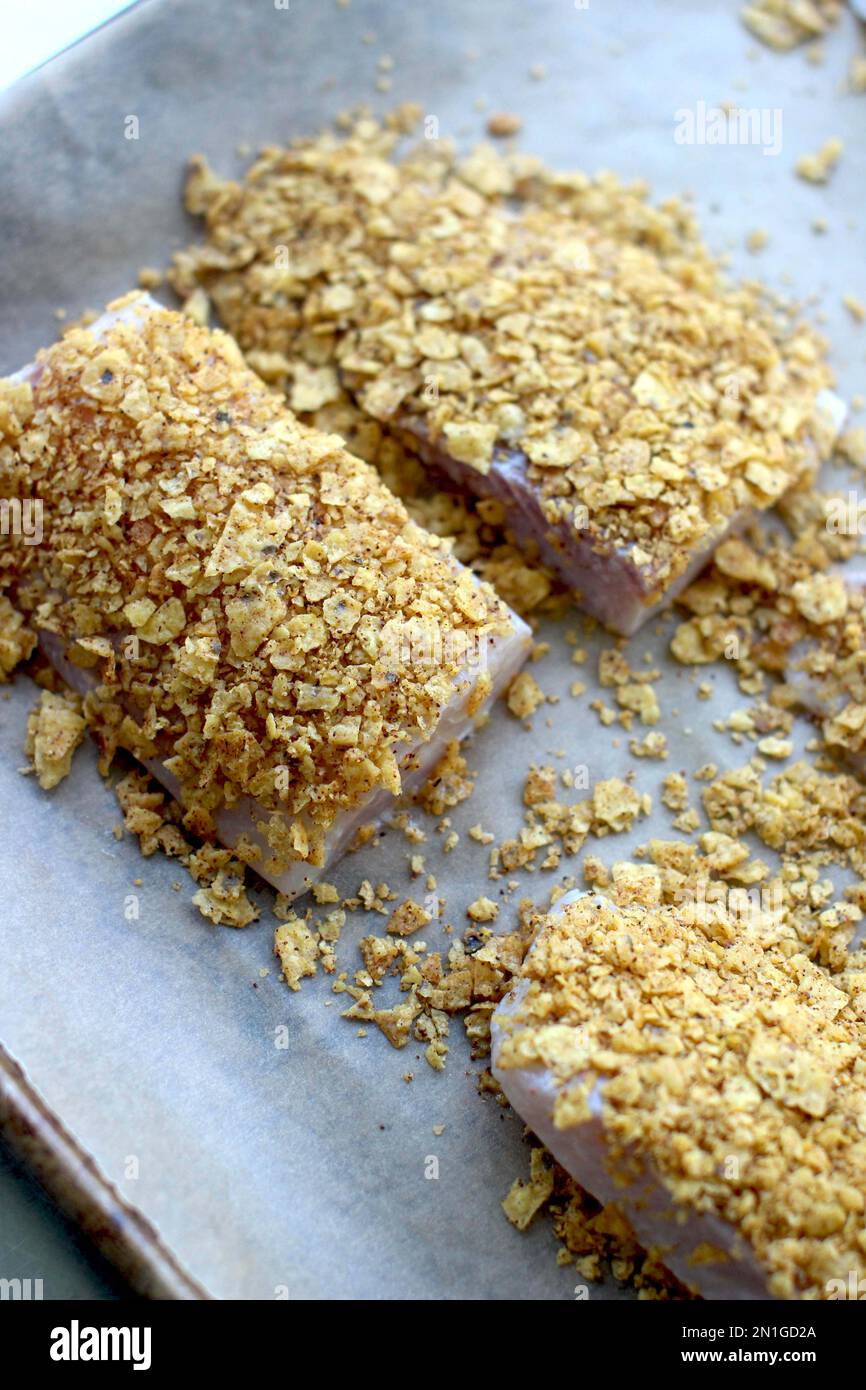 This Aug. 3, 2015 photo shows tortilla crusted tilapia with pickled red ...