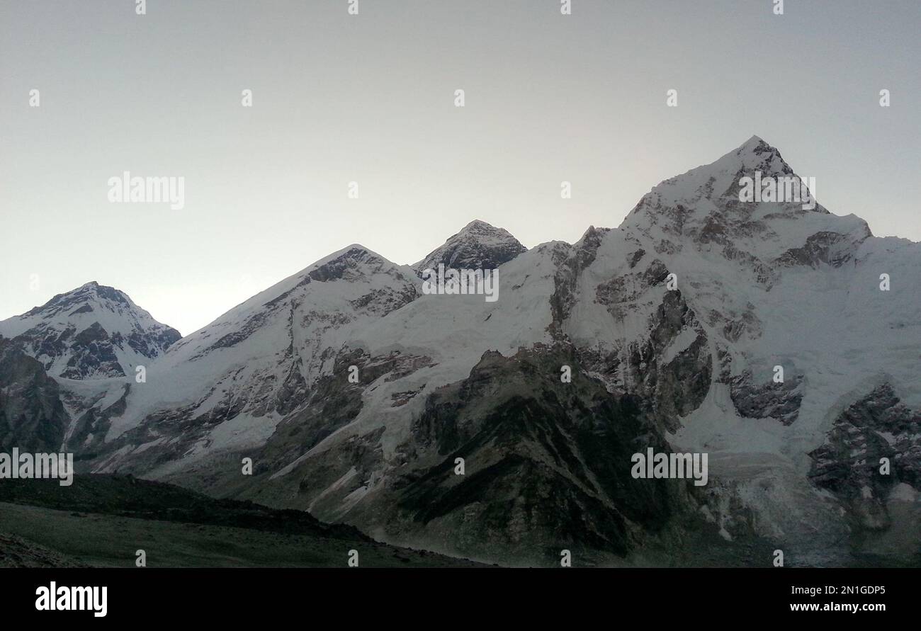In this Wednesday, Sept. 2, 2015 photo, Mount Everest, third peak from ...