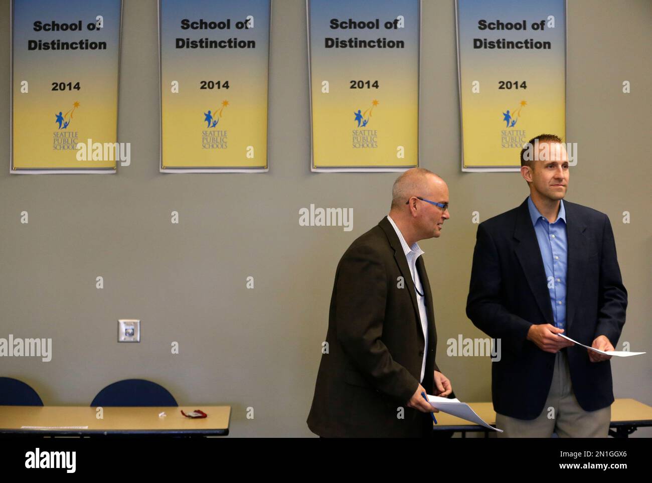 Seattle Public Schools bargaining team members Jon Halfaker, left ...