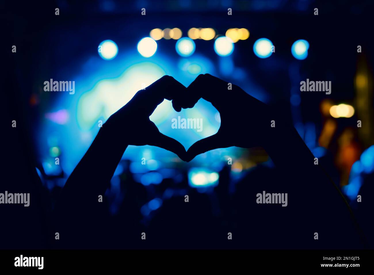 Excited person with hands making heart hi-res stock photography and ...