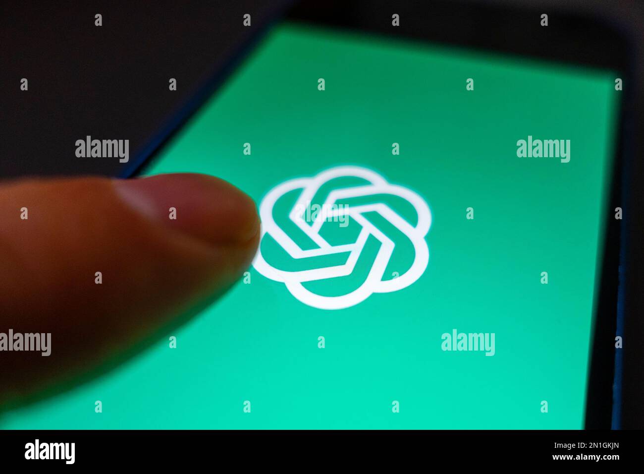 Using An Openai App By Chatgpt On Phone Screen Concept Image Stock