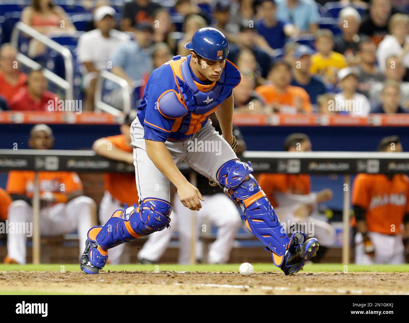 New York Mets catcher Anthony Recker (20) picks up the ball during a ...