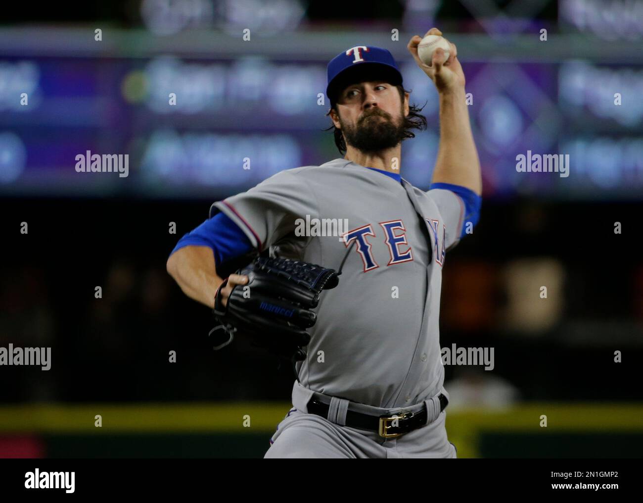 Texas Rangers Starting Pitcher Cole Hamels Pitches During A Baseball