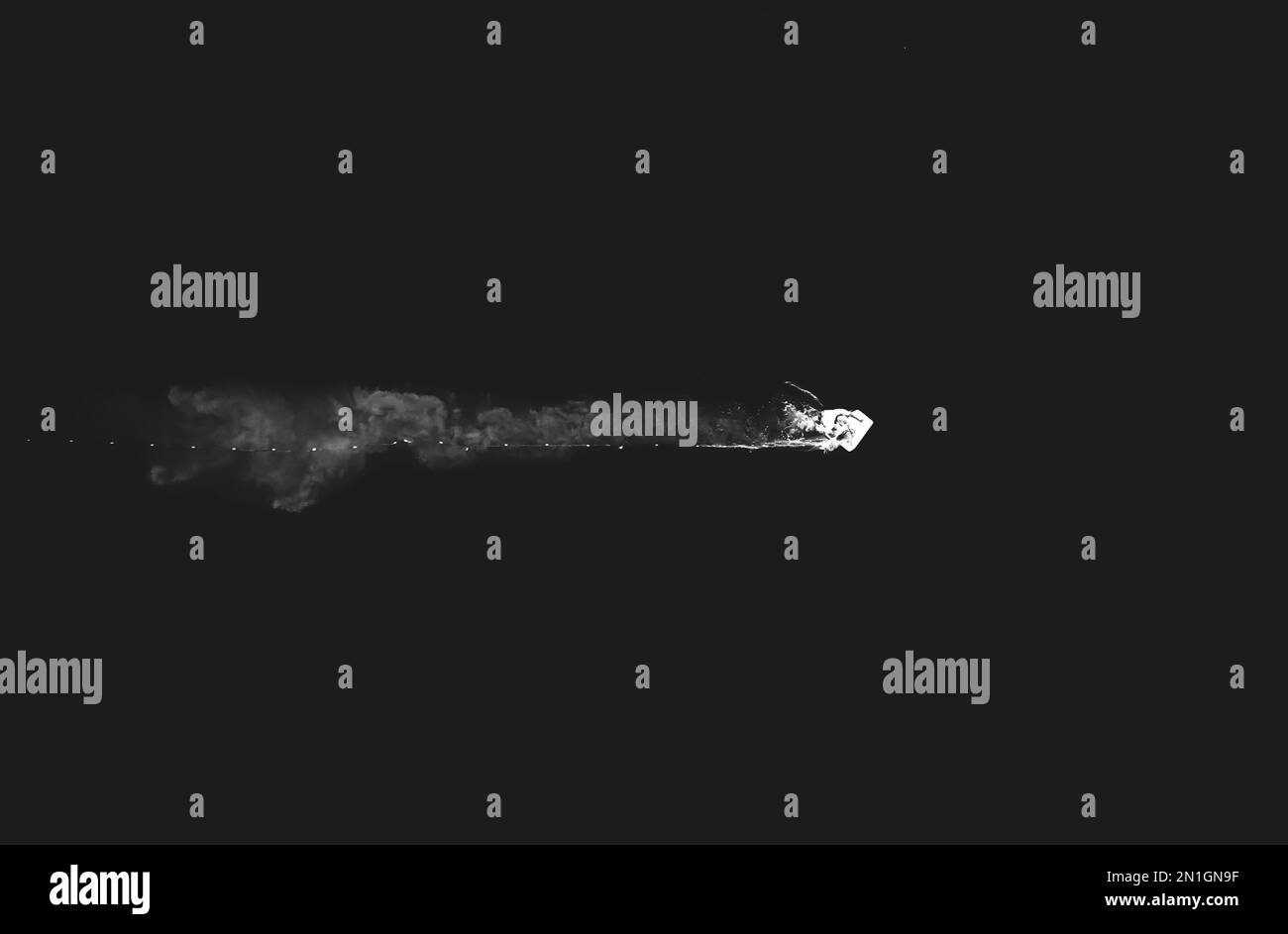 Top down fishermen catch fish using fishing netting. Black and white ...